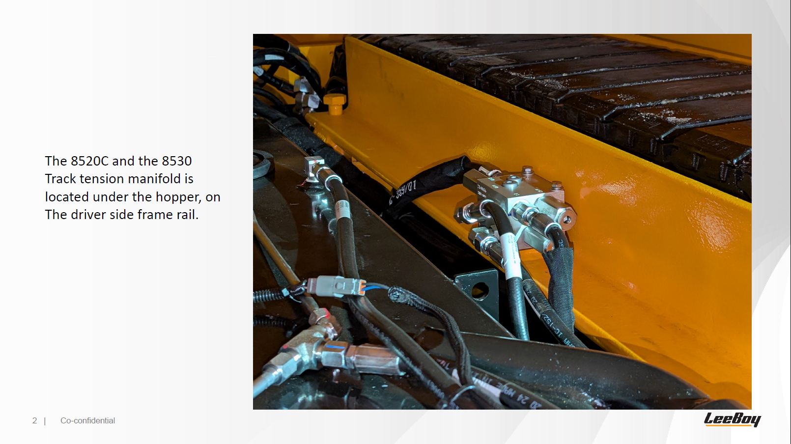 Dual track tension manifold adjustment. – LeeBoy